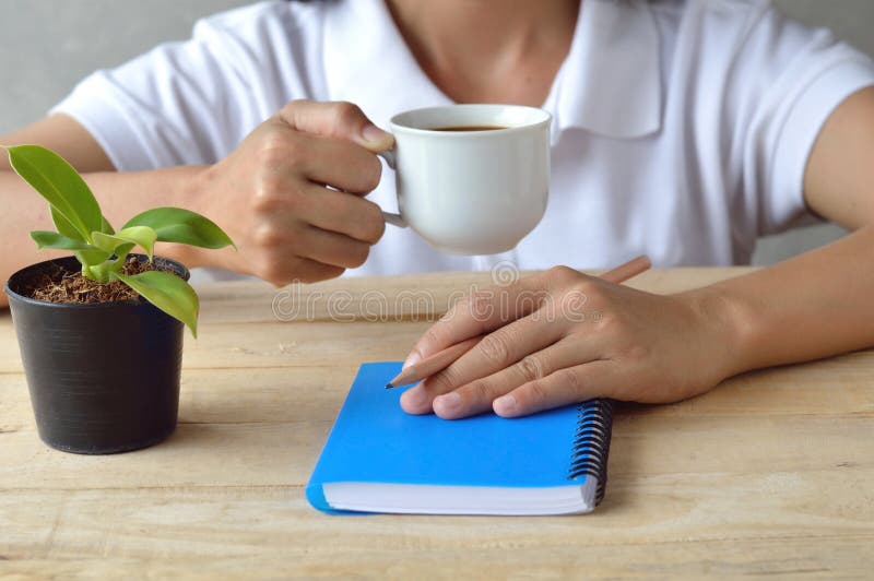 Female Writing and Drink Coffee Stock Image - Image of hand, female ...