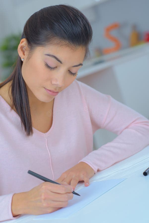 Female writing a letter stock image. Image of handwriting - 116229151