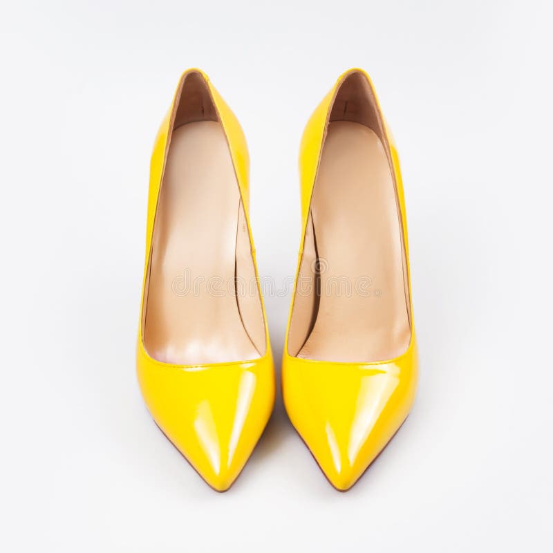 Female yellow shoes stock photo. Image of female, clothing - 82844696