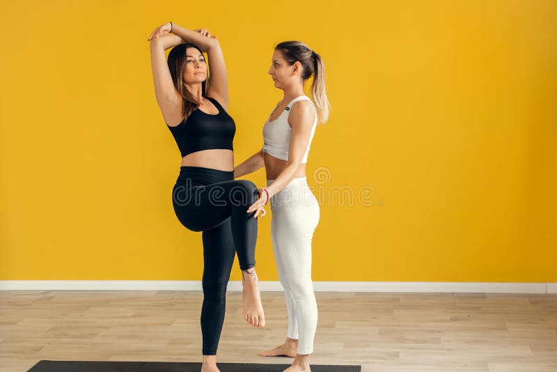 At Gym. Coach Controls Girl Training on Simulator Stock Image - Image ...
