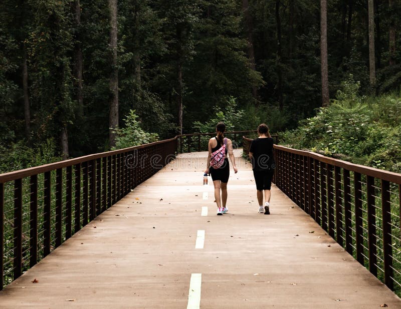 Females Walking Down in the Path Stock Image - Image of healthy ...