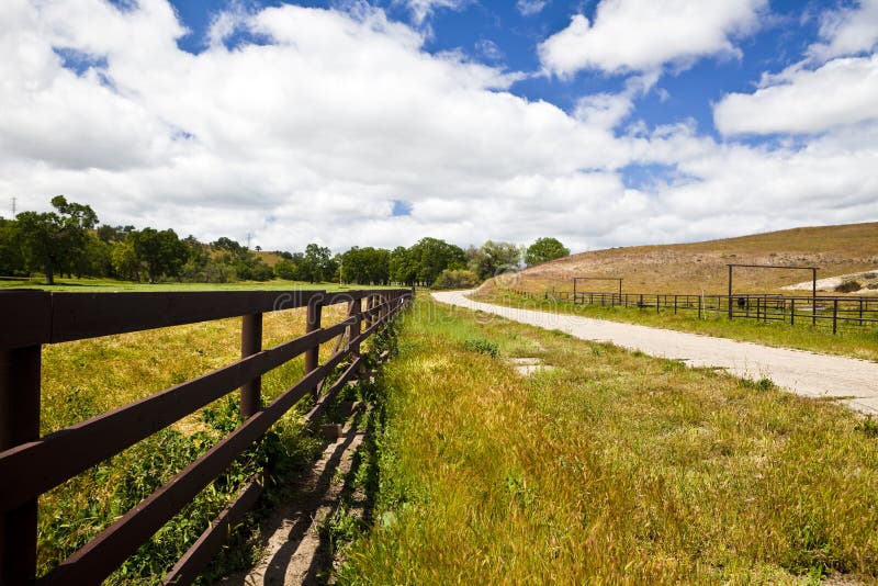 Fence Along a Country Road stock image. Image of narrow - 14193701