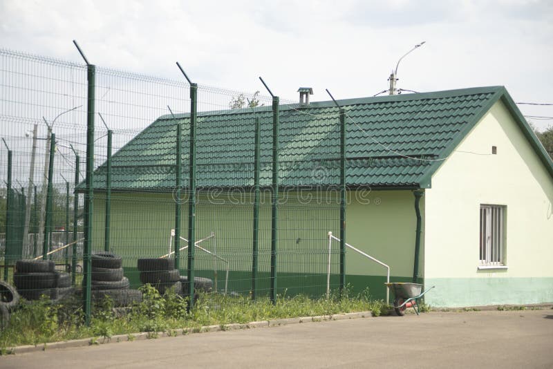 Fence Around the Sports Field. High Fence Stock Image - Image of ...