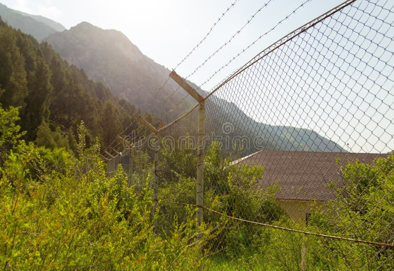 Fence with Barbed Wire in the Open Air Stock Image - Image of forbidden ...