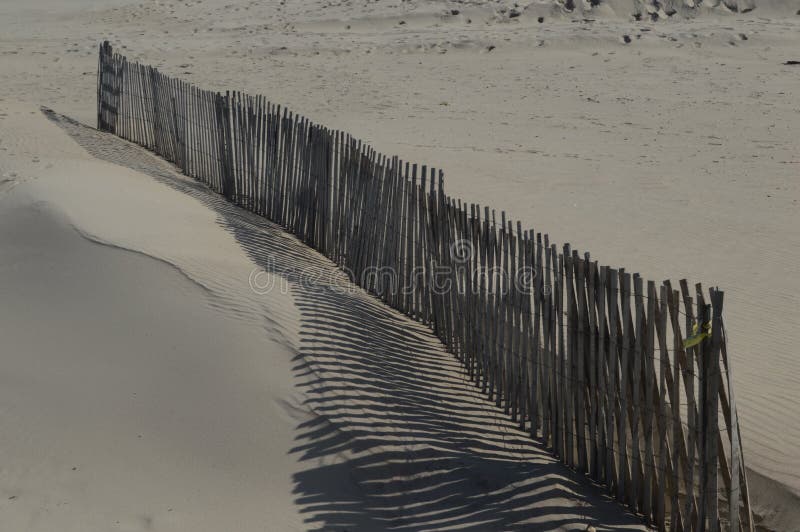 Fence on the beach stock image. Image of ocean, beach - 68075845