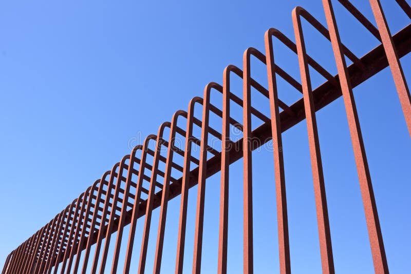 Fence with bent metal rods stock photo. Image of metallic - 27754854