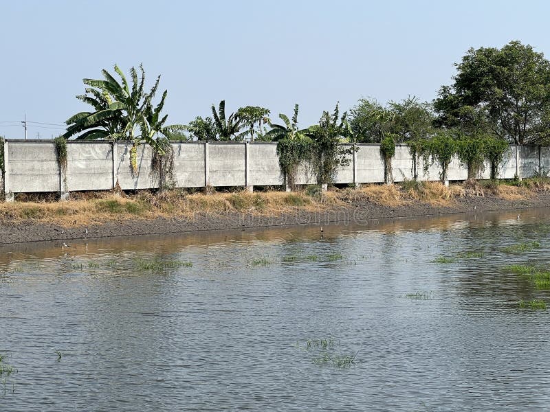 The Fence and the Border Near the Water Stock Photo - Image of ...