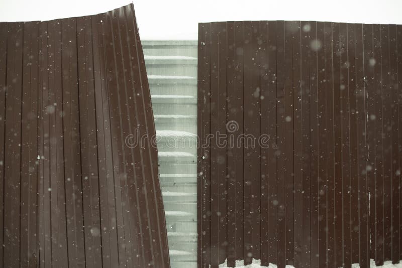 Fence Broken. Steel Profile in Wind Stock Photo - Image of damaged ...