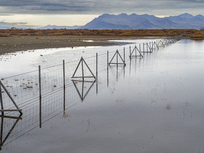 Fence Flooded with Water after Rain 2. Stock Photo - Image of ...