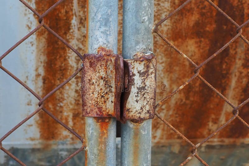 A fence gate full of rust stock image. Image of floor - 183421877