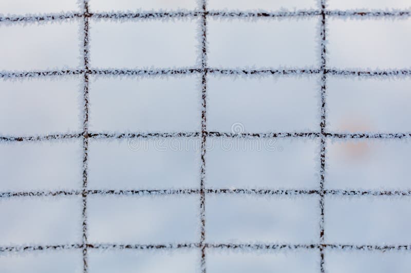 A Fence with a Grid Pattern is Covered in Ice Stock Image - Image of ...