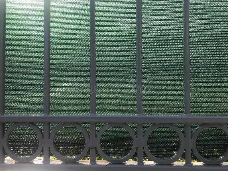 Fence Grille from Metal with Green Mesh Stock Image - Image of ...