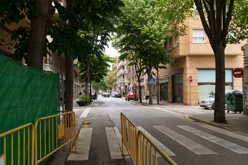 A Fence Installed on a City Street Road for Pedestrian Passage ...