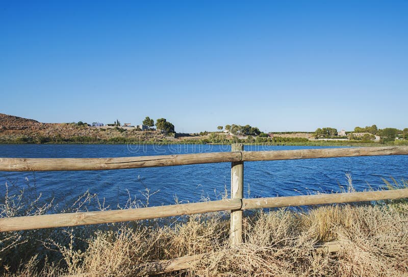 Fence by a lake stock photo. Image of blue, canada, national - 76453608