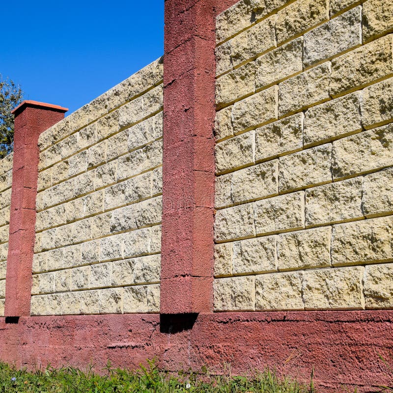 Fence Made of Bricks and Decorative Plaste Stock Image - Image of ...