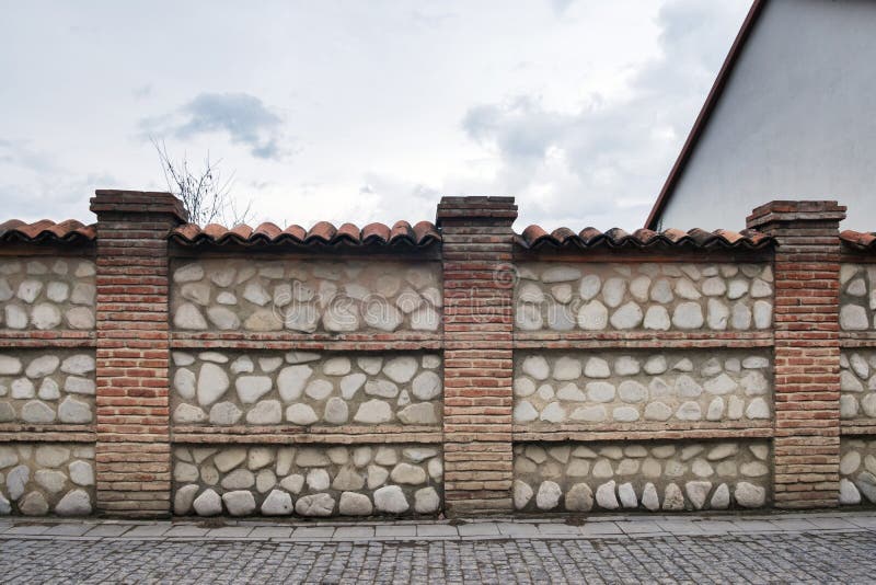 Fence Made with Rocks and Bricks Stock Photo - Image of exterior ...