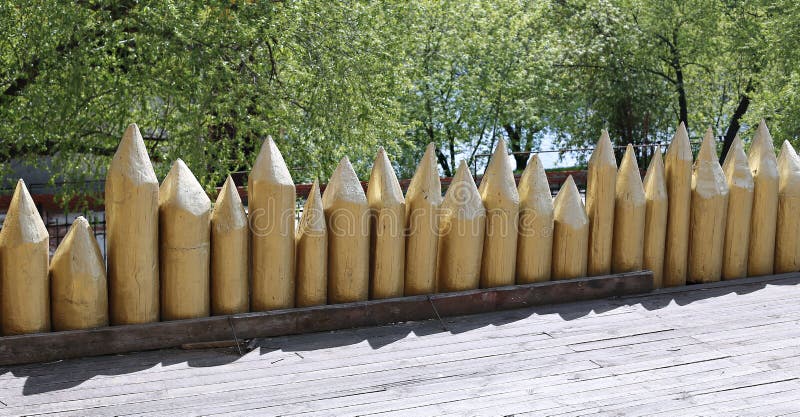Fence Made of Sharpened Logs Stock Photo - Image of antiseptic ...