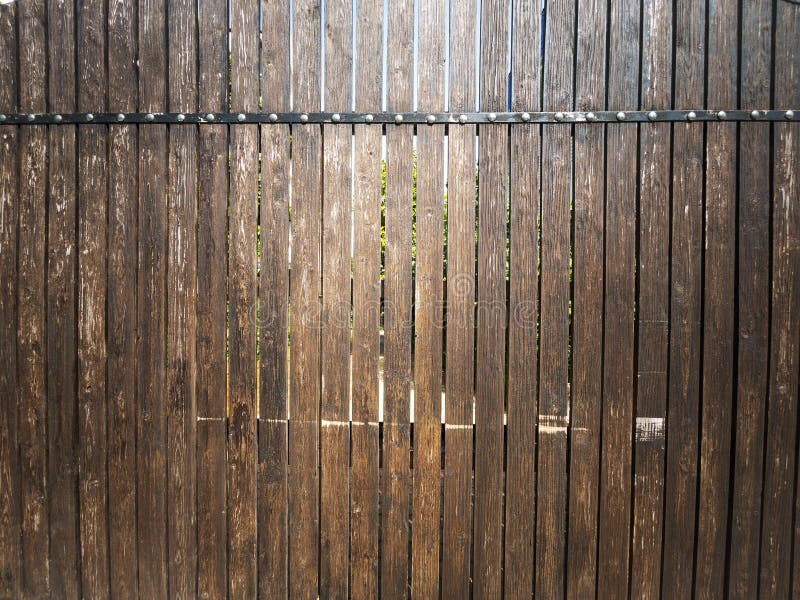 Fence Made of Vertical Boards of Natural Wood Stock Photo - Image of ...