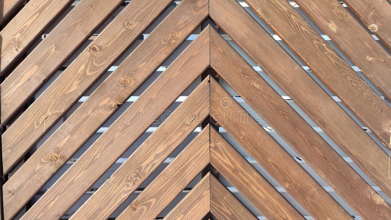 Fence Made of Wooden Slats with a Pattern in the Shape of a Fir Tree As ...