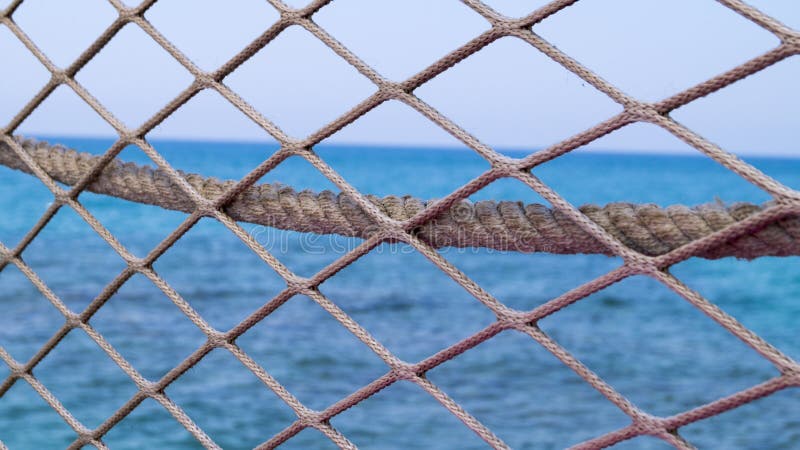 The fence on the pier stock photo. Image of fence, rope - 95841162