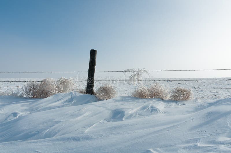Fence Post in Snow Drift stock image. Image of saskatchewan - 138761619