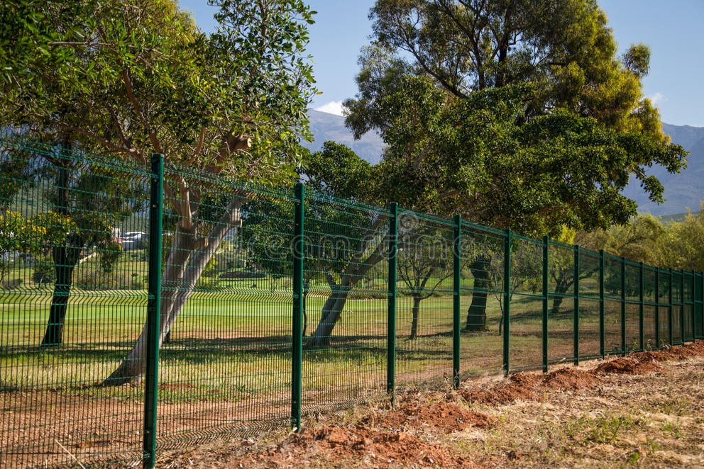 Fence Protoecting a Golf Course Stock Photo - Image of activities ...