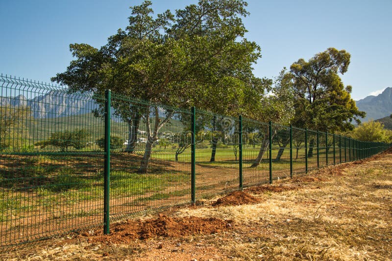Fence Protoecting a Golf Course Stock Image - Image of recreation ...