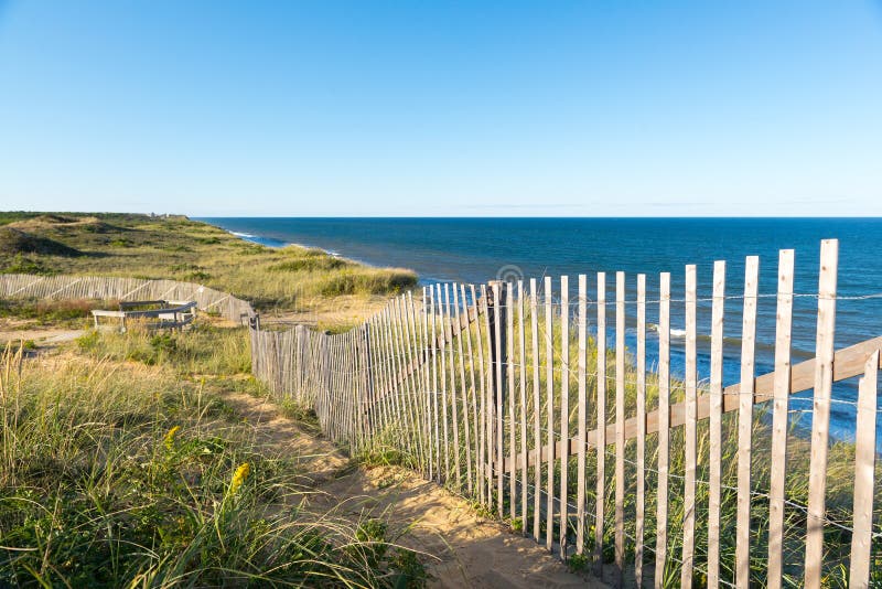 Fence on Sand Dune Near the Atlantic Ocean, Cape Cod, USA Stock Photo ...
