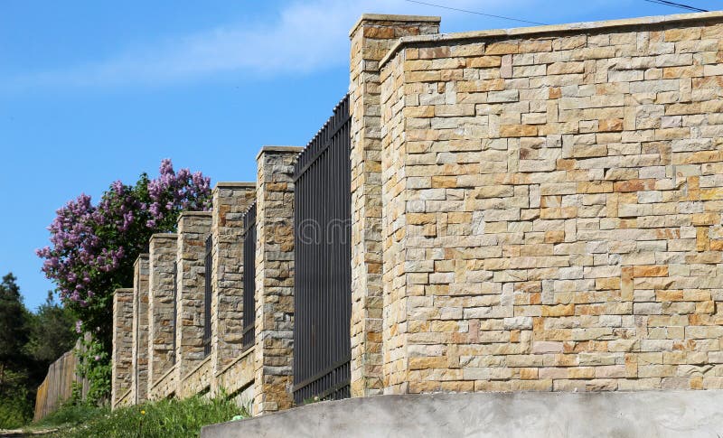 Fence Using Metal and Stone Stock Image - Image of style, columns ...