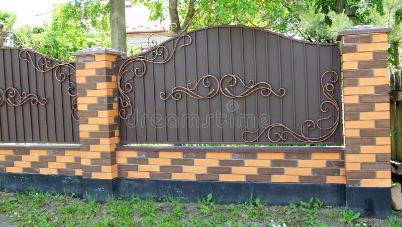 Fence Using Metal and Stone Stock Photo - Image of fence, garden: 303524376