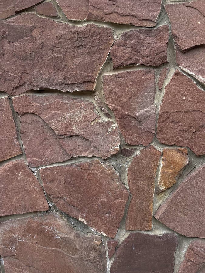 The Fence Wall is Made of a Large Pink Stone Stock Image - Image of ...