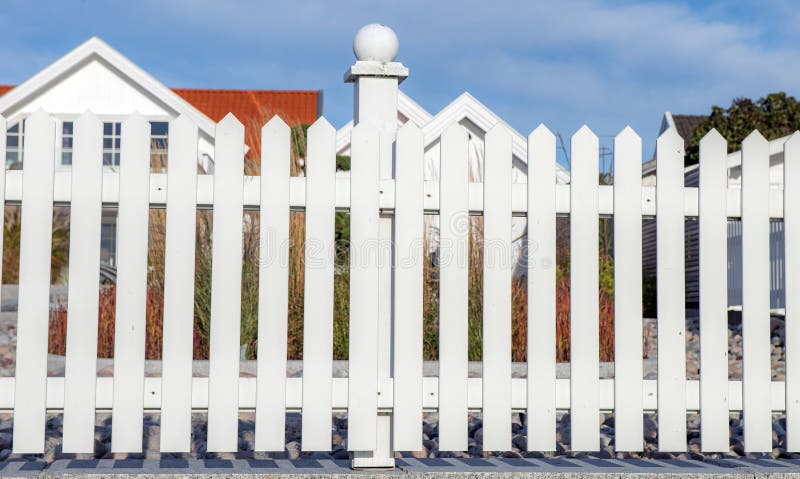 Fence of a White Wooden Garden in Front of Windows on White Facade ...