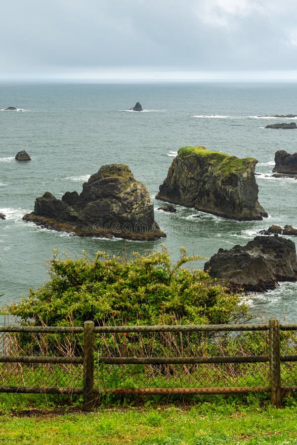 A Fenced Part of Arch Rock Viewpoint Overlooking Rock Formations in the ...