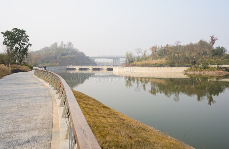 Fenced Riverside Path in Sunny Winter Afternoon Stock Image - Image of ...