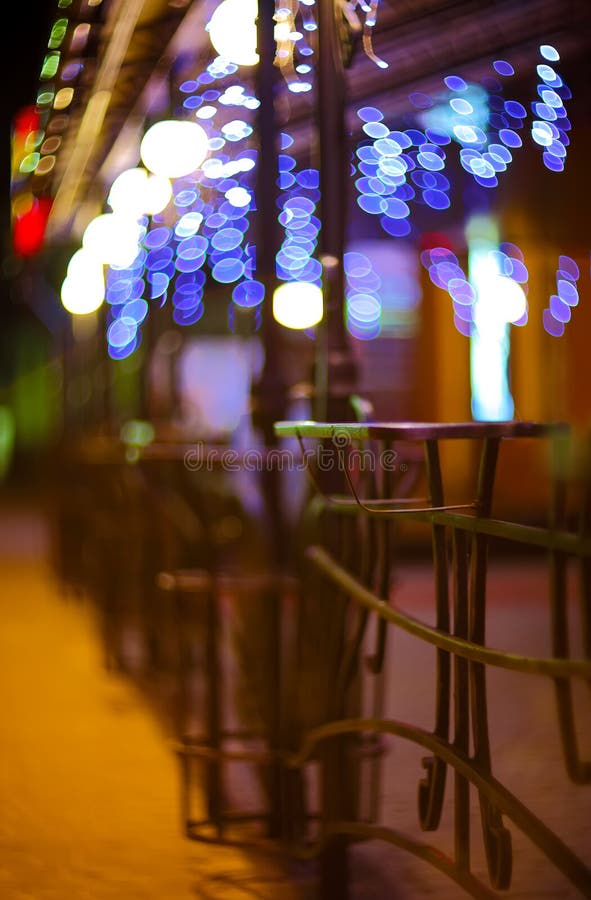 Fences and Blurred Night Lights Decorations of the Bar on Backg Stock ...