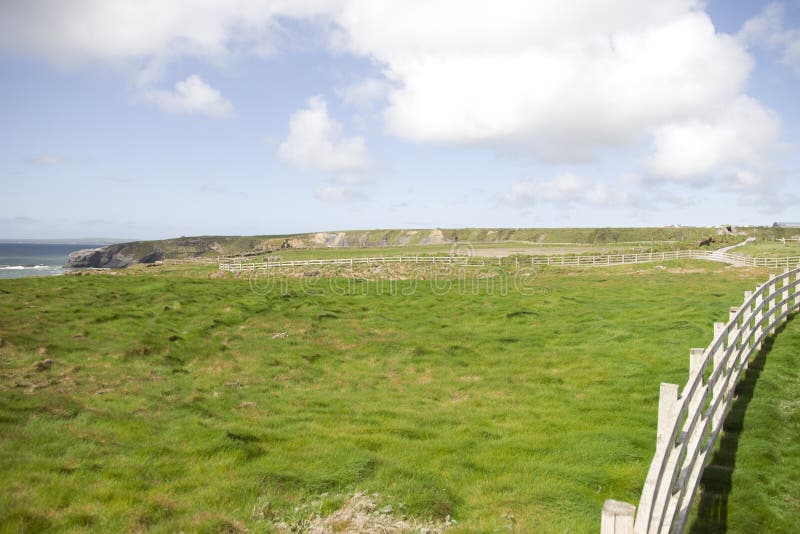 Fencing Along a Cliff Walk Path Stock Photo - Image of cloud, blue ...