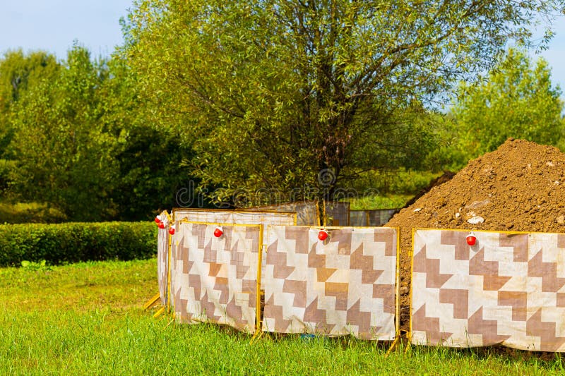 Fencing the Area during Excavation Work in the Park Stock Photo - Image ...
