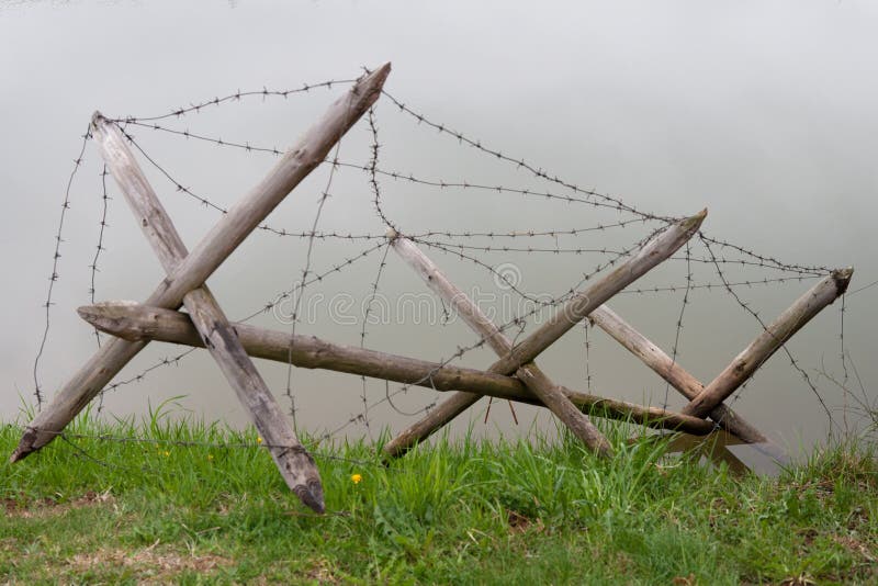 Fencing with barbed wire stock photo. Image of grass - 22290466