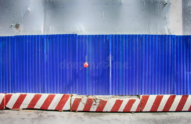 Fencing of Construction Site with Red Construction Light on the ...