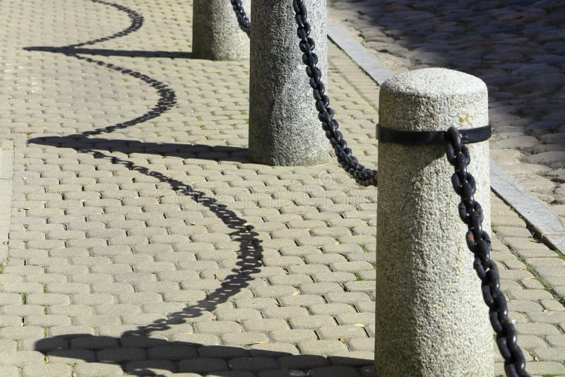 Fencing with Granite Poles and a Metal Chain. Stock Photo - Image of ...