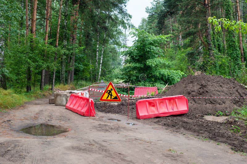 Fencing of a Pit Excavated on a Dirt Forest Road. Stock Photo - Image ...