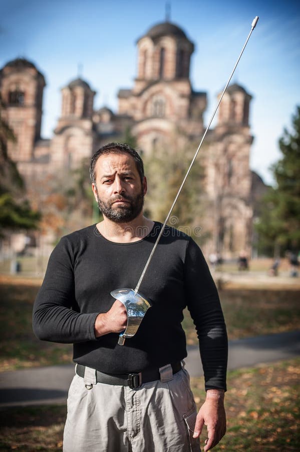 Fencing Swordsman Instructor Demonstrates Sword Fighting Techniques and ...
