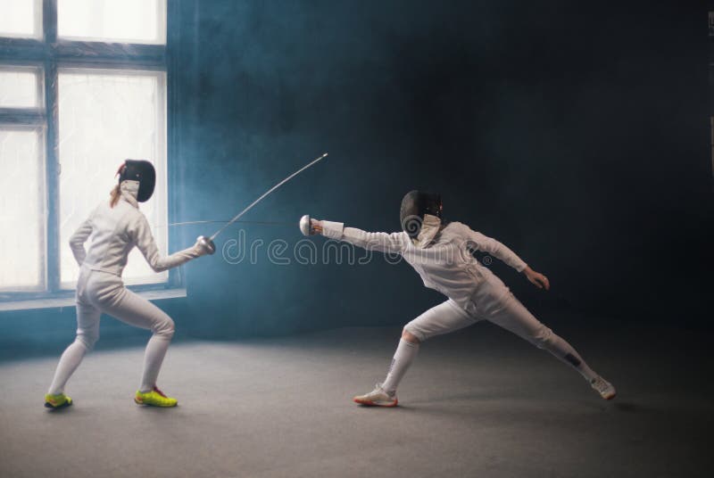 A Fencing Training - Two Women Having a Duel Stock Photo - Image of ...