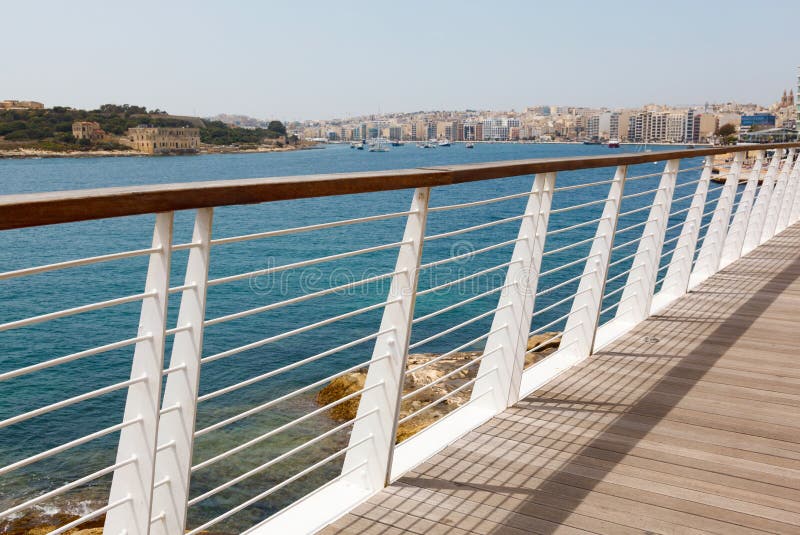 Fencing and Wooden Floor on the Seafront Stock Image - Image of ...