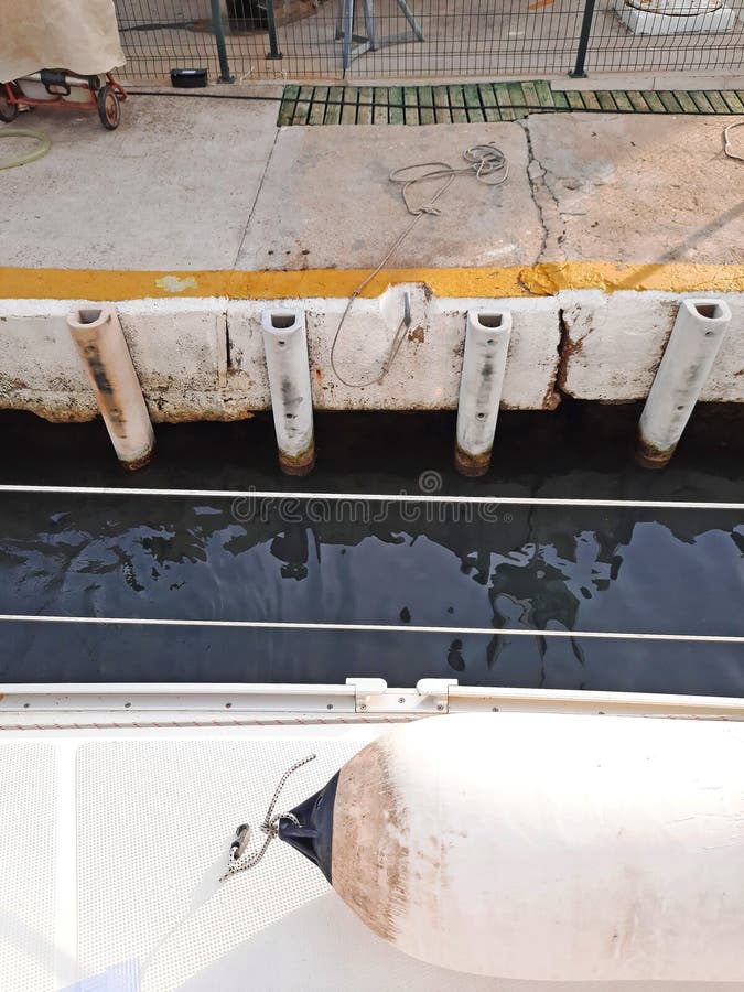 Fenders Suspended between a Boat and Dockside for Protection. Maritime ...