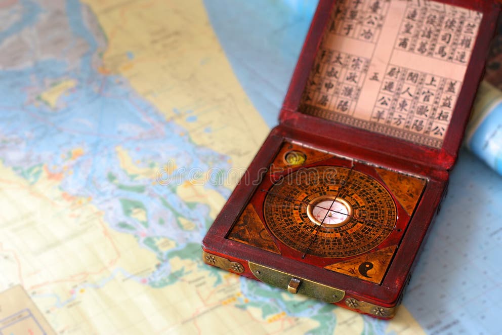 Feng Shui Compass on a Nautical Chart Stock Photo - Image of lost ...