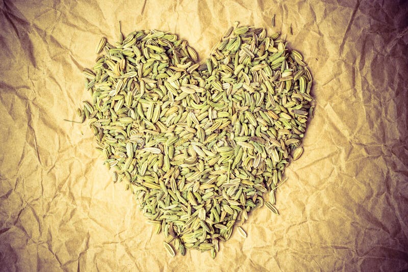 Fennel Dill Seeds Heart Shaped on Paper Surface Stock Image - Image of ...