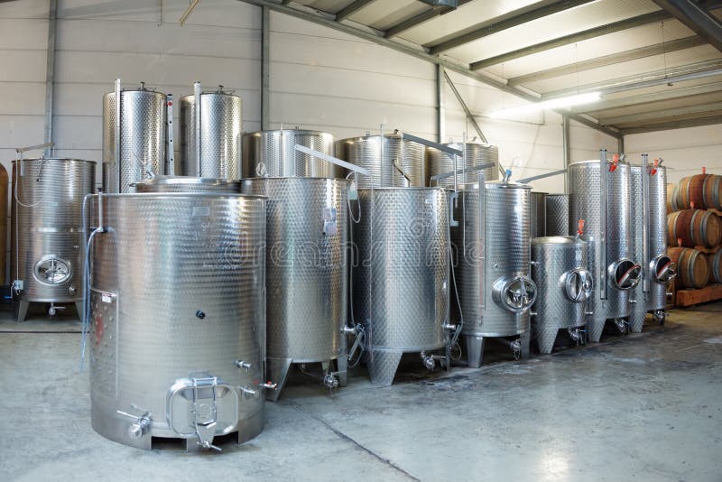 Wine fermentation vats stock image. Image of machinery - 3550021
