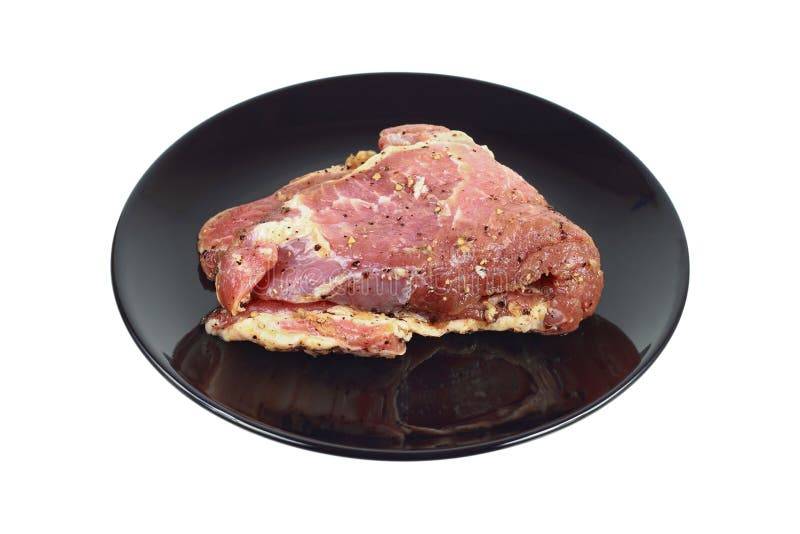 Fermented Meat on Black Plate Isolated on White Stock Photo - Image of ...