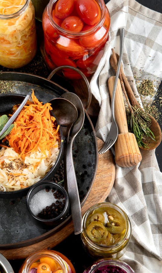 Fermented Products on a Dark Background. Pickled Vegetables in Jars ...